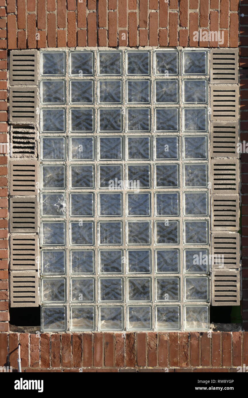 Tile window at red brick wall Stock Photo - Alamy