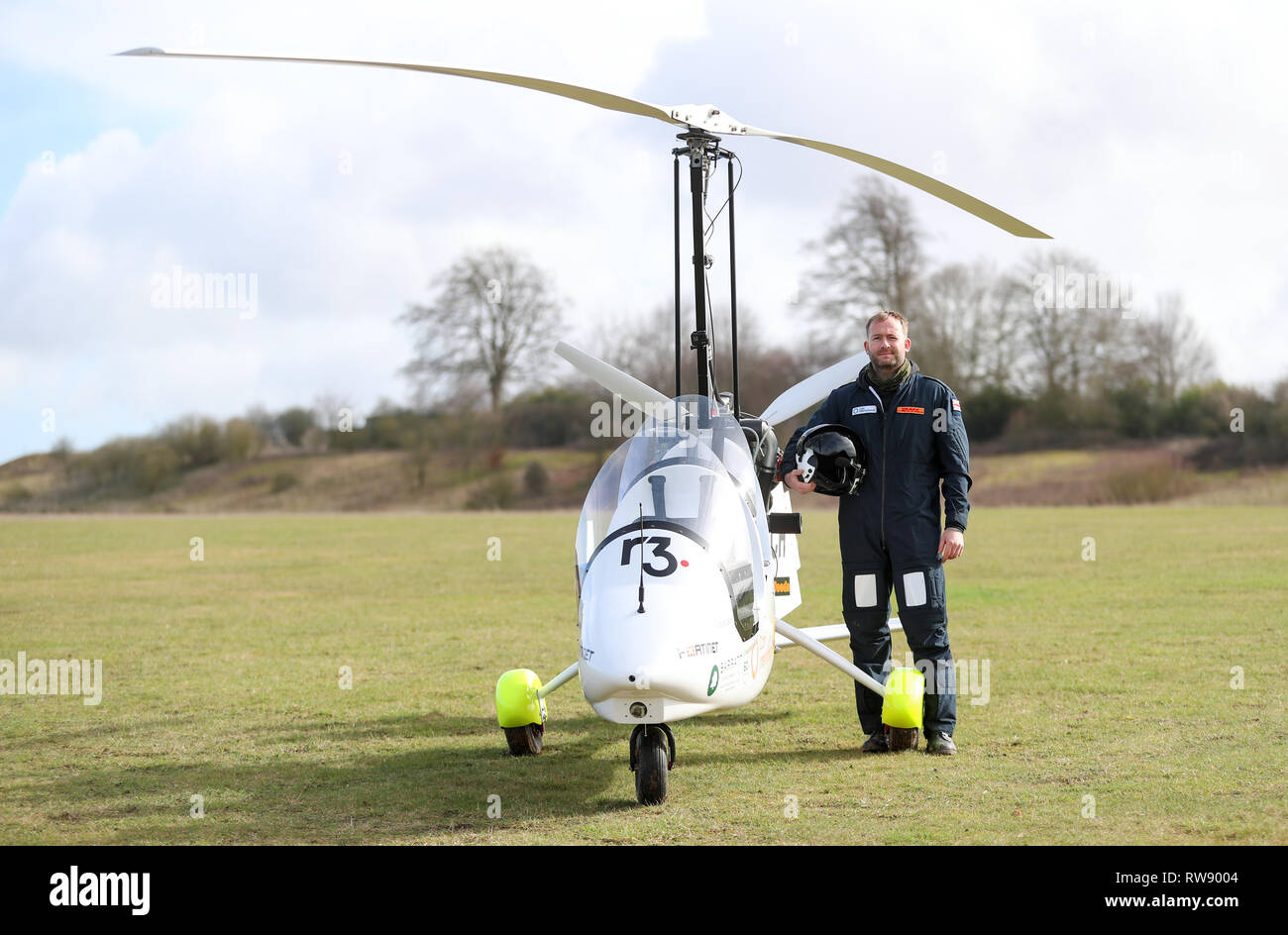 James Ketchell next to his open cockpit gyrocopter at Popham Airfield ...