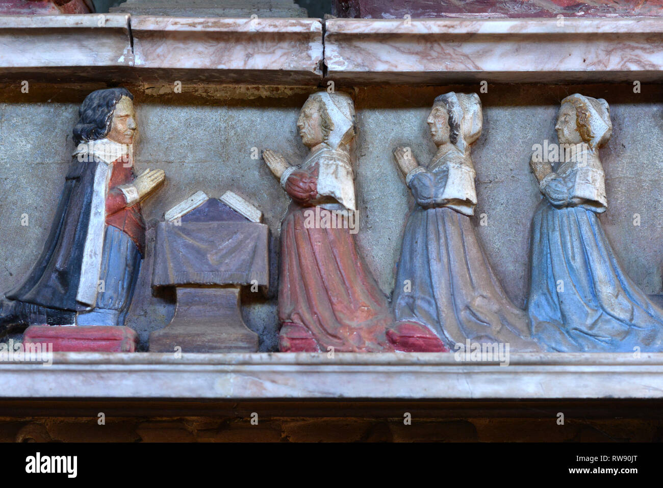 Medieval relief carving of a praying family. St Dunstan's Church ...