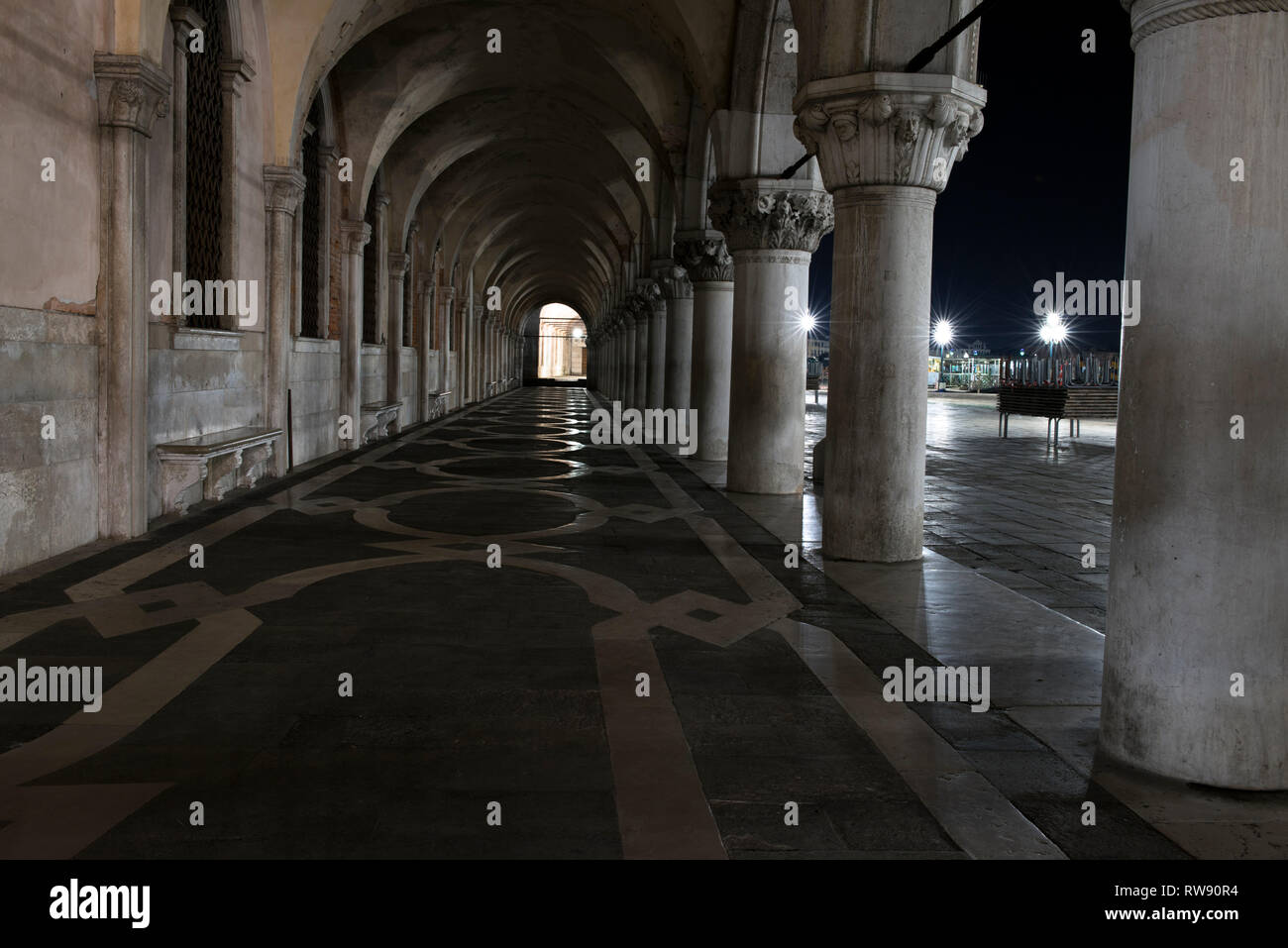 Row of arches underneath the Doge's Palace in Piazza San Marco in ...