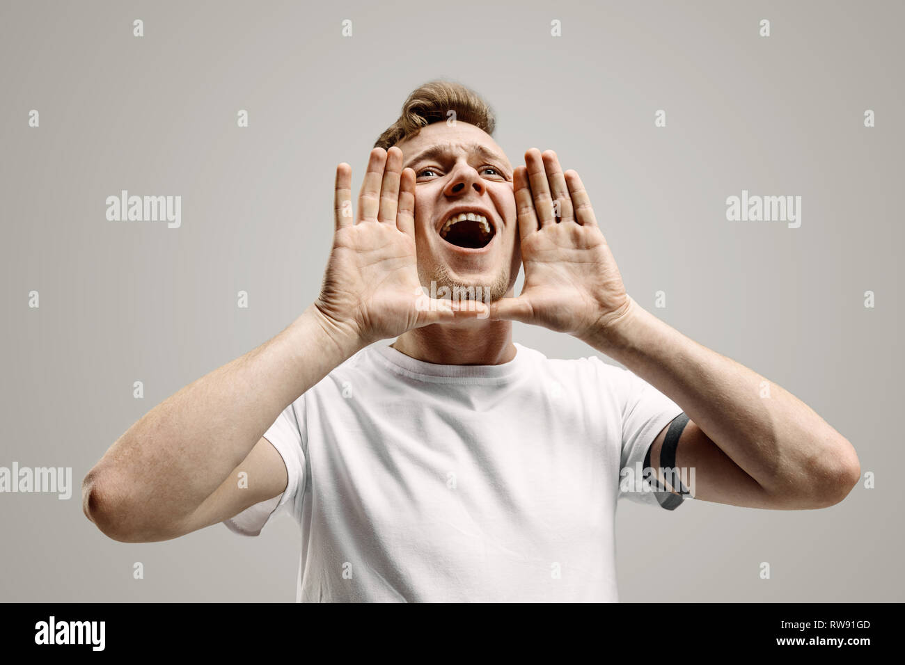 Do not miss. Young casual man shouting. Shout. Crying emotional man ...