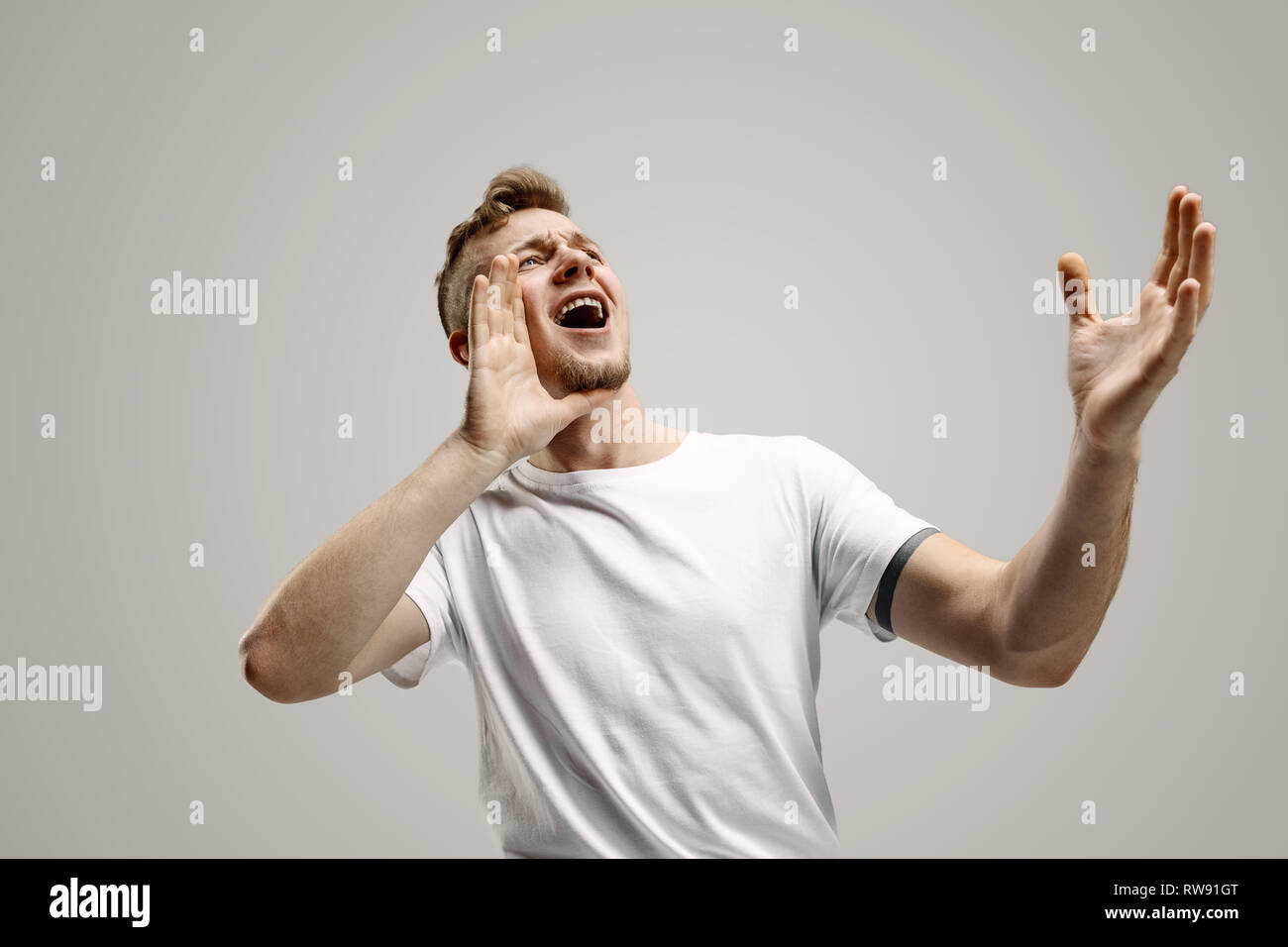 Do not miss. Young casual man shouting. Shout. Crying emotional man ...