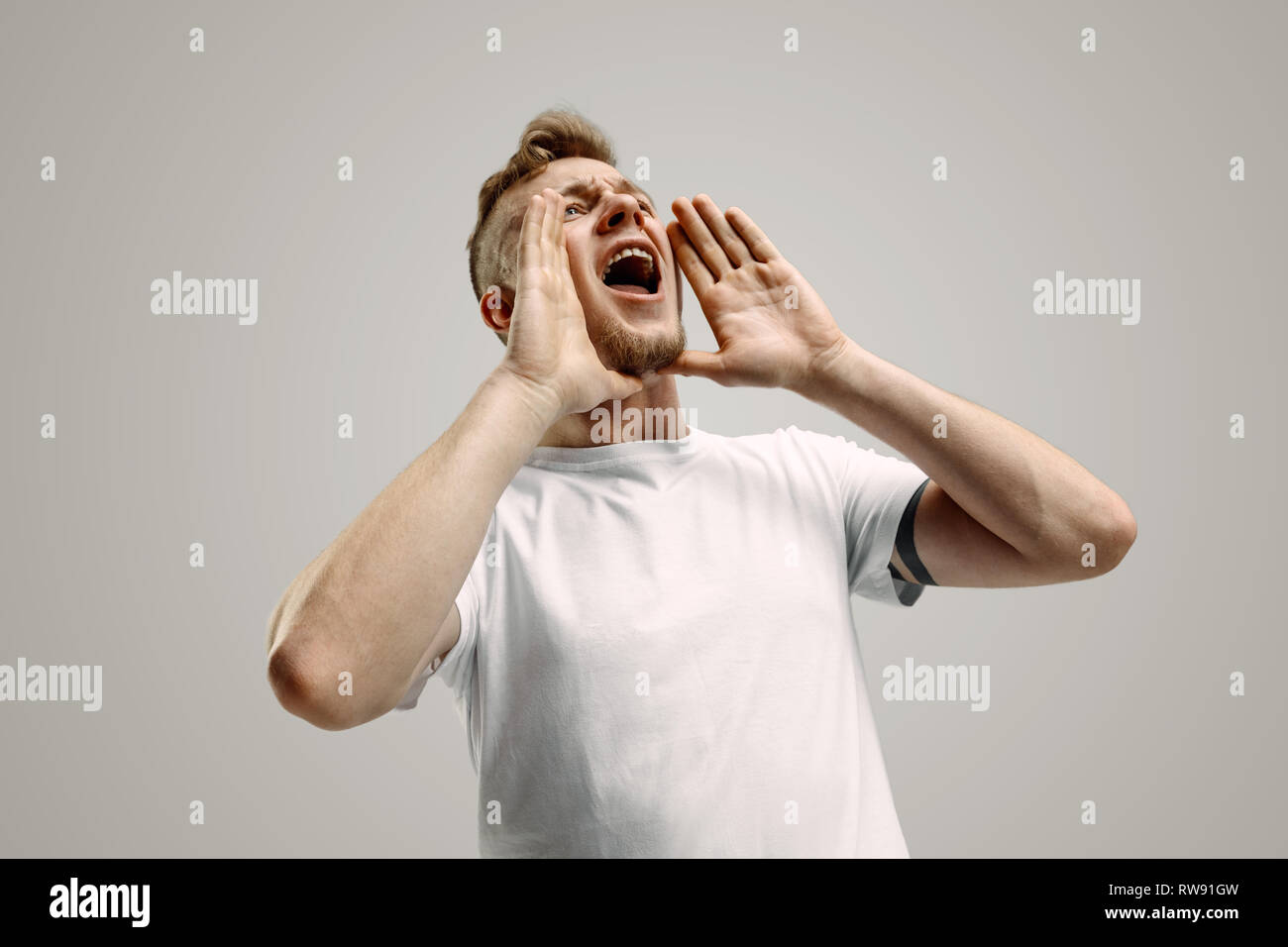 Do not miss. Young casual man shouting. Shout. Crying emotional man ...