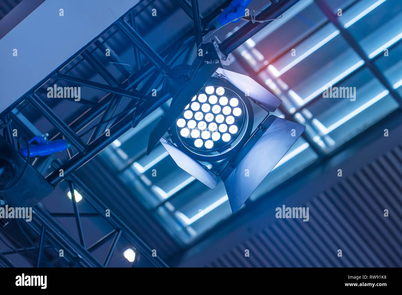 spotlights on a theatre stage lighting rig for consert Stock Photo - Alamy
