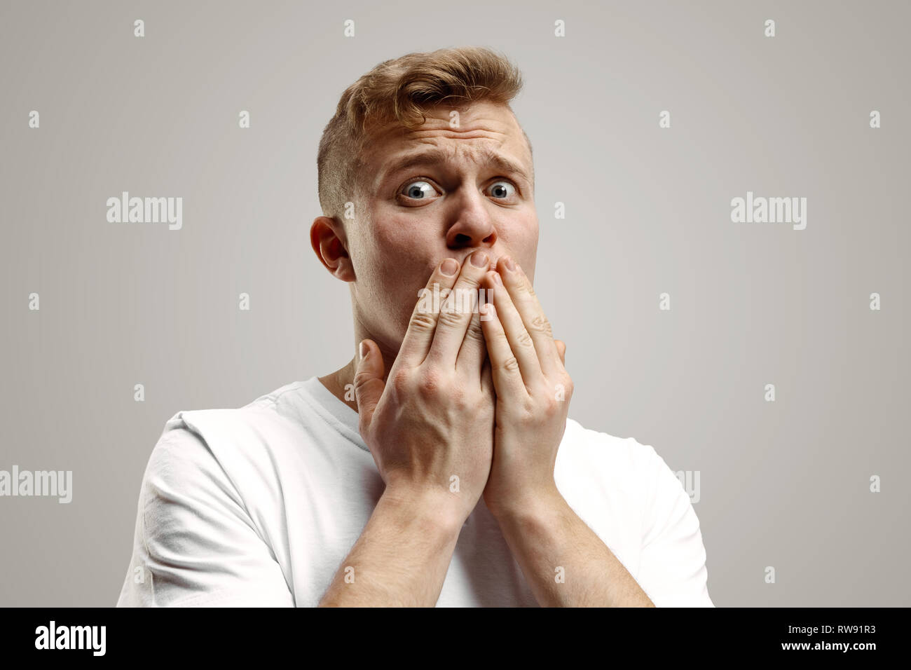 I'm afraid. Fright. Portrait of the scared man. Business man standing ...