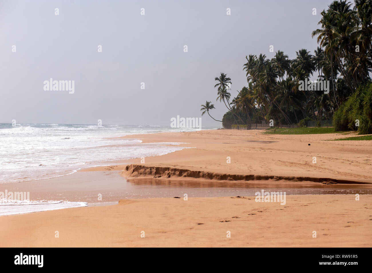 Beautiful beach, ocean and sand. Poster for resort Stock Photo - Alamy