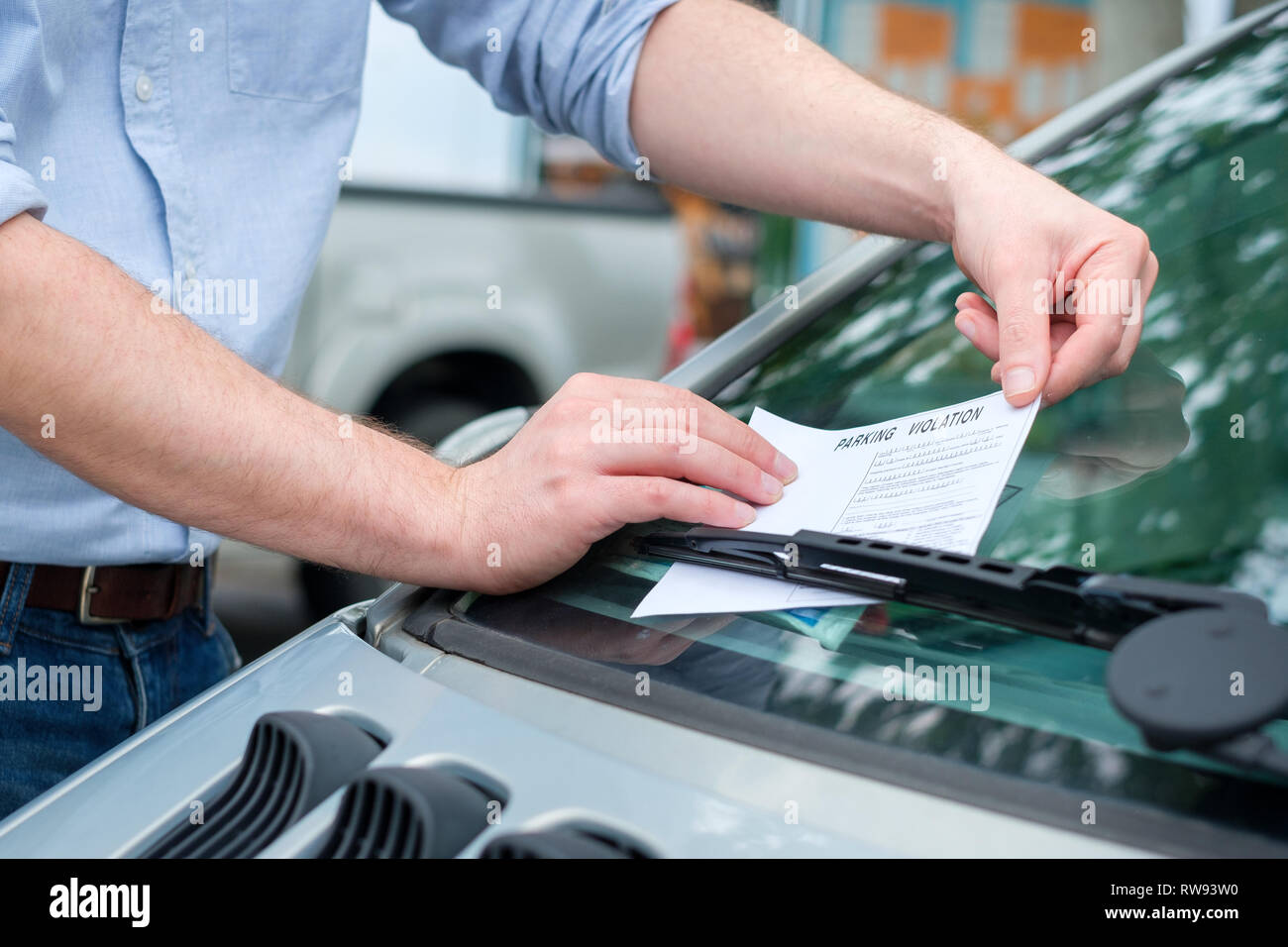 Hand holding ticket hi-res stock photography and images - Alamy