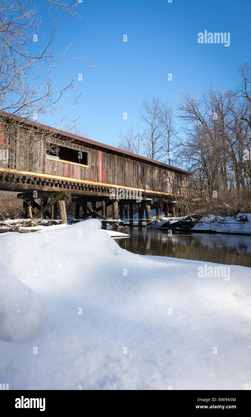 The Clarence covered bridge in Decatur, Wisconsin, on a cold winters ...
