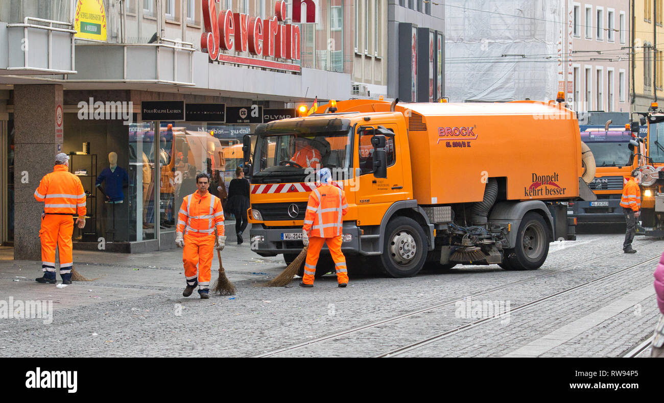 Wurzburg, Germany - 3 March 2019: workers cleaning dirty roads and city ...