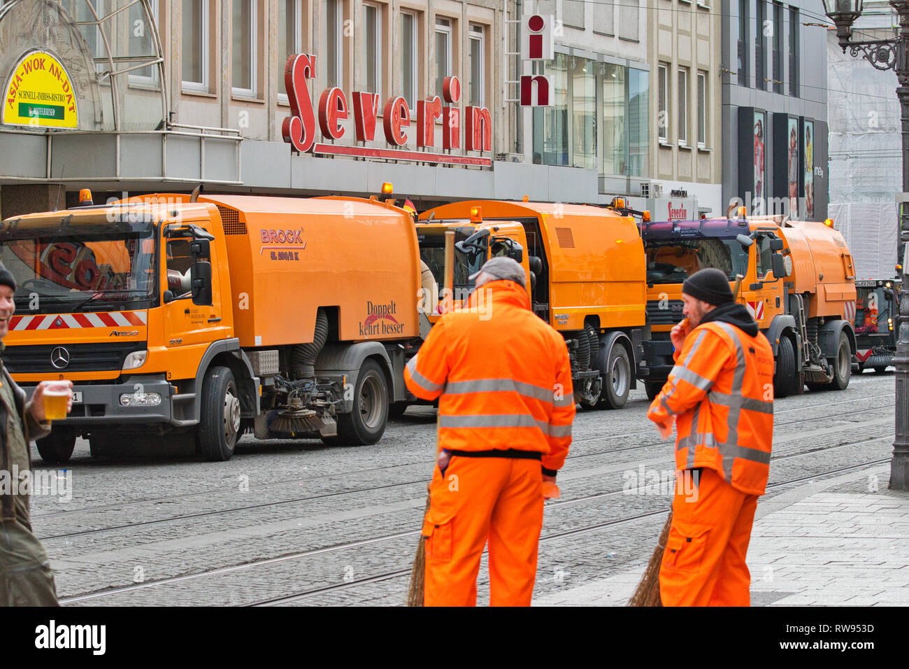 Wurzburg, Germany - 3 March 2019: workers cleaning dirty roads and city ...
