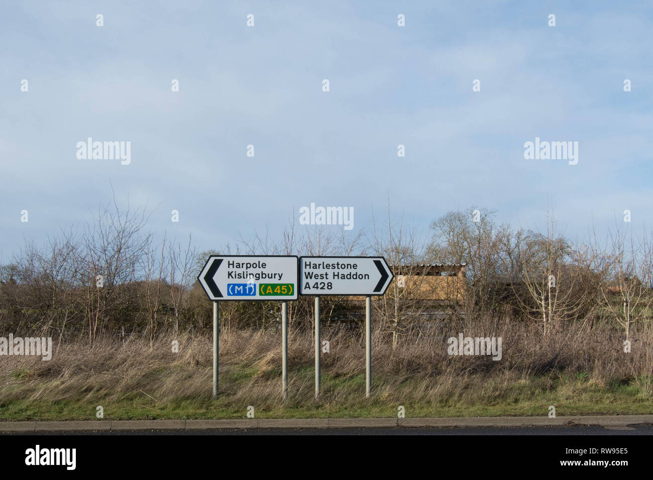 Signpost for Harpole Kislingbury Harlestone and West Hadden M1 A45 ...