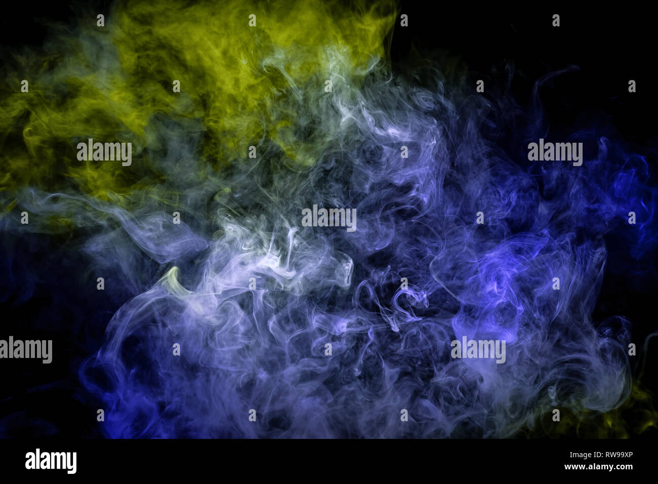 Frozen abstract movement of explosion smoke multiple colors green and ...