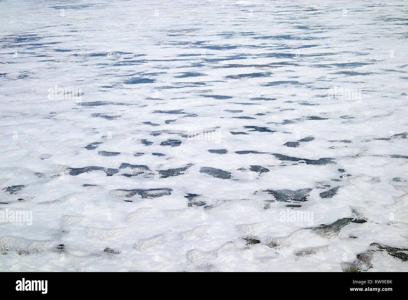 frozen lake surface, Finland Stock Photo - Alamy