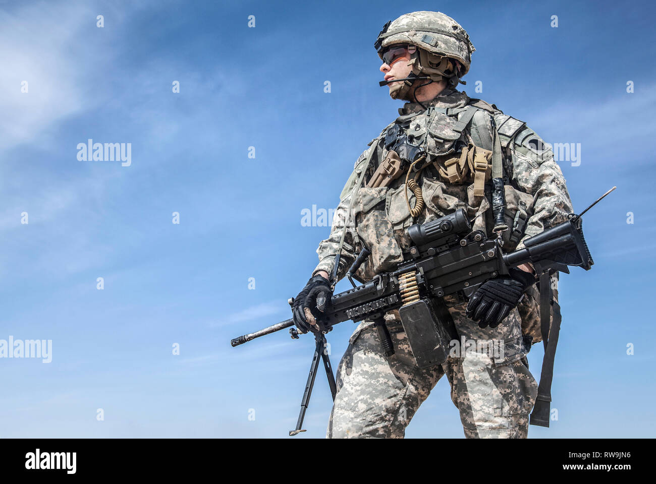 Portrait of United States airborne infantry corporal with machine gun ...