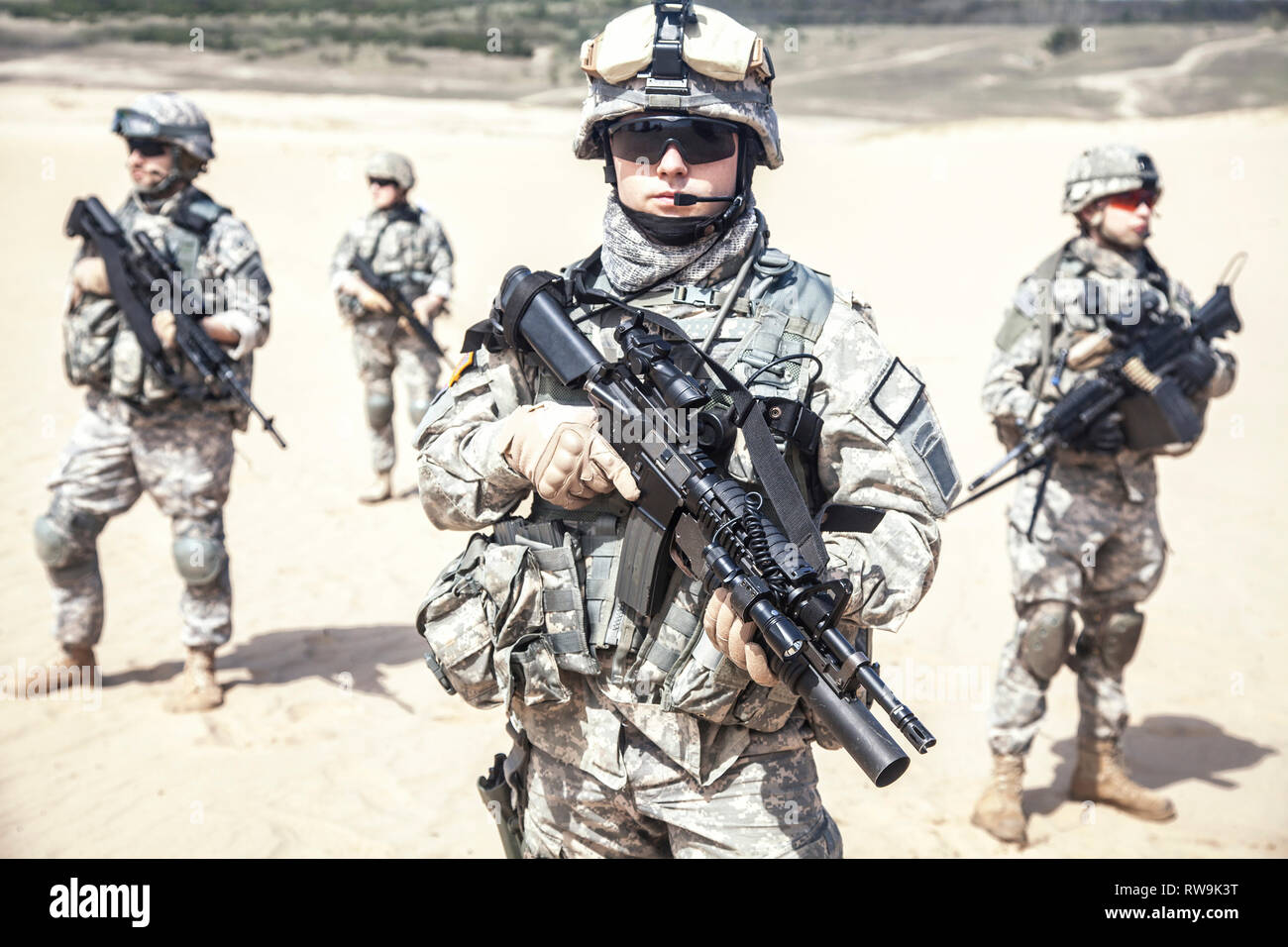 Team of United States airborne infantry men in camo uniforms Stock ...