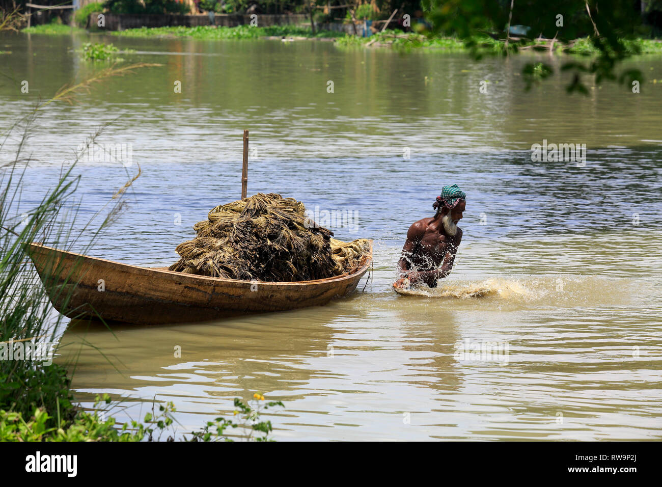 Farmer washing jute fibres in hi-res stock photography and images - Alamy