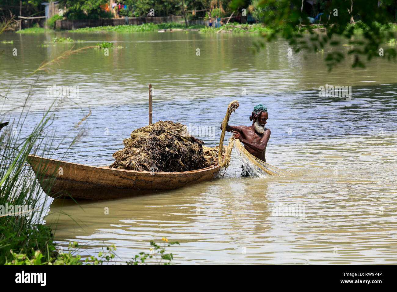 Farmer washing jute fibres in hi-res stock photography and images - Alamy
