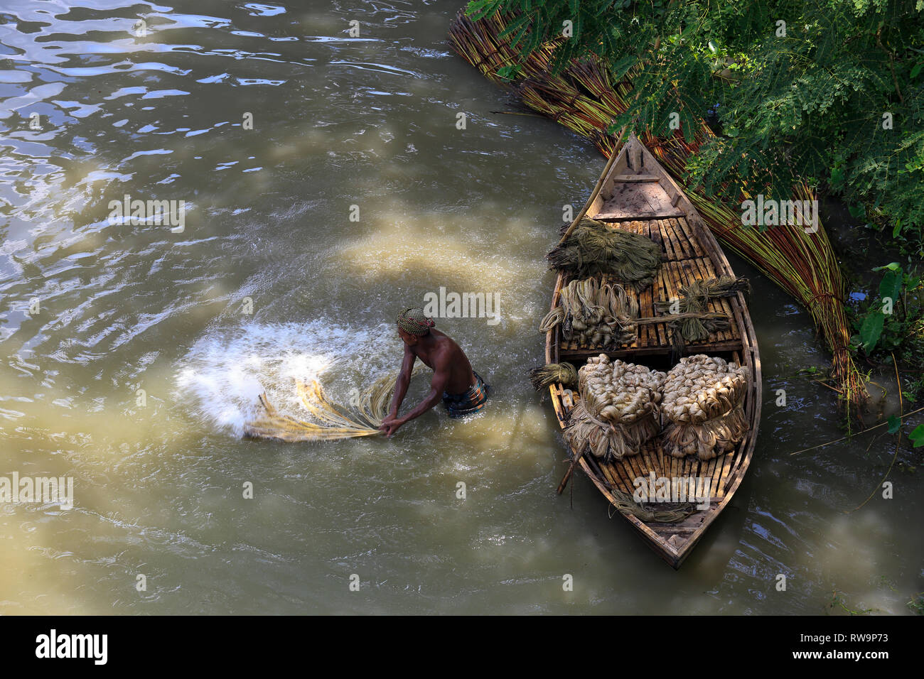 Farmer washing jute fibres in hi-res stock photography and images - Alamy
