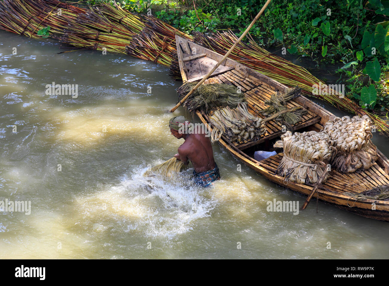 Farmer washing jute fibres in hi-res stock photography and images - Alamy