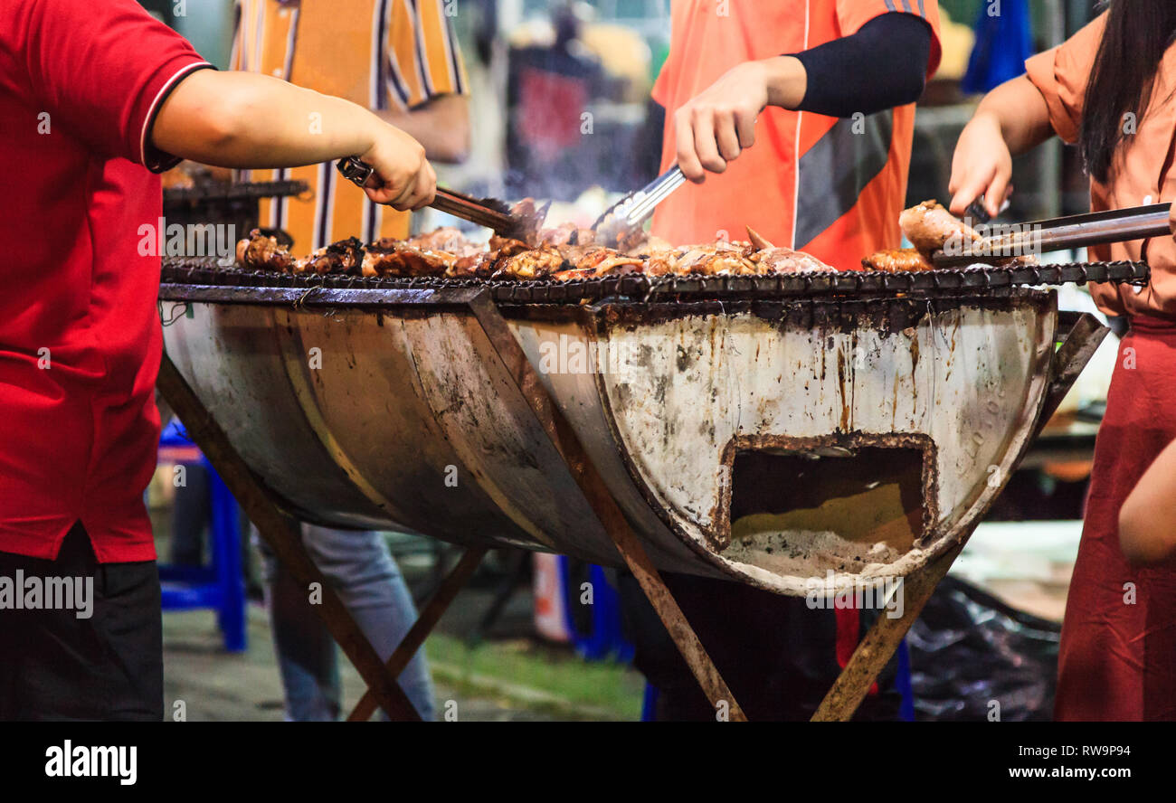 Traditional Thai Street Food, Beef barbecue grill on outdoor fireplace ...
