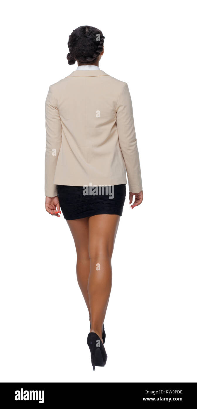 Back view of a black African-American in a suit that goes with his hand ...