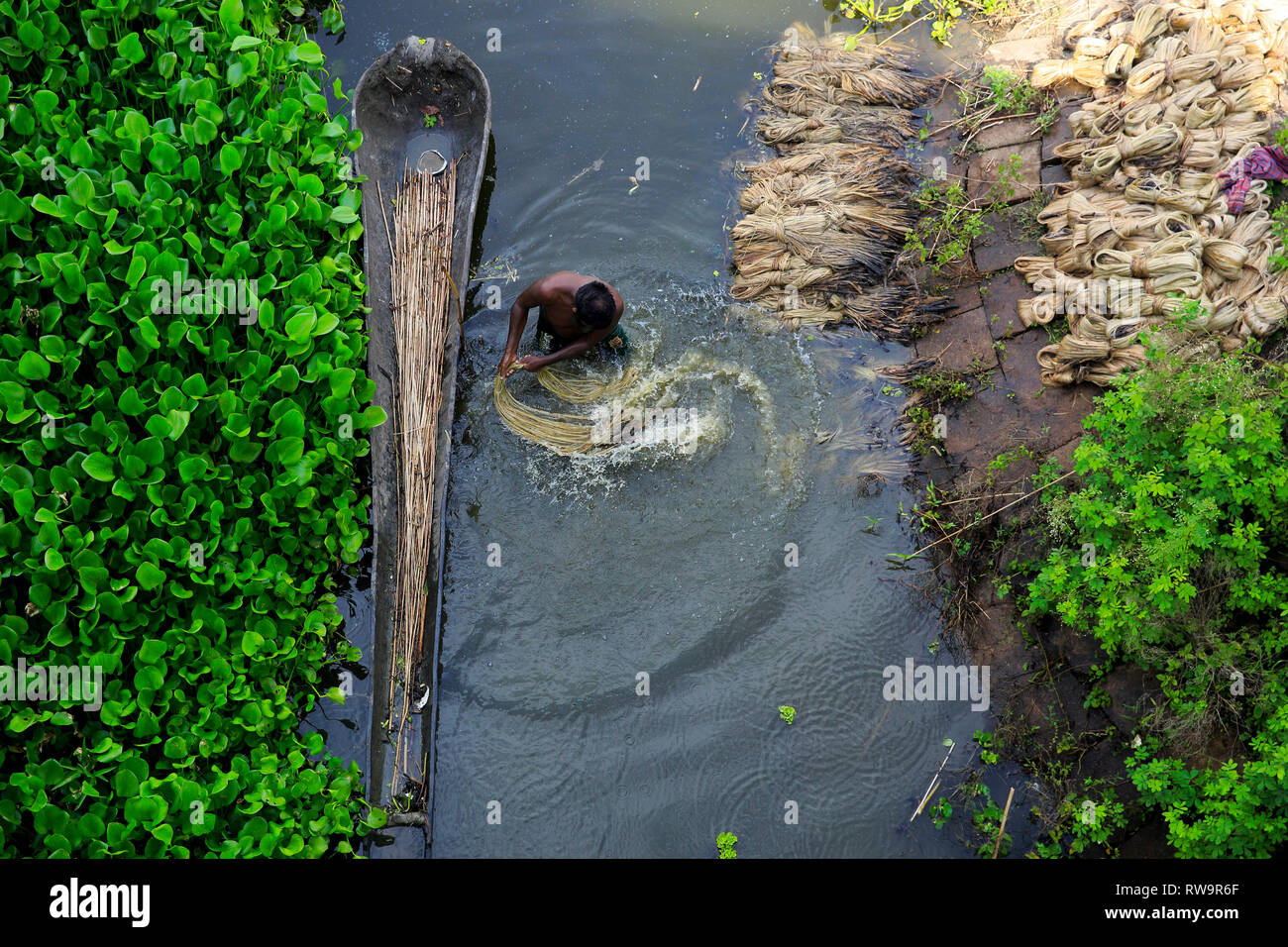 Farmer washing jute fibres in hi-res stock photography and images - Alamy