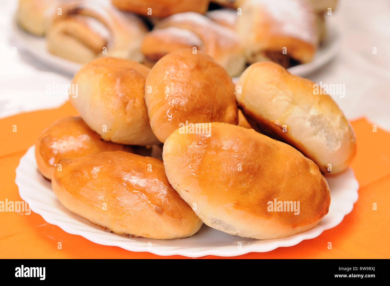 cross bun stack on a white plate Stock Photo - Alamy