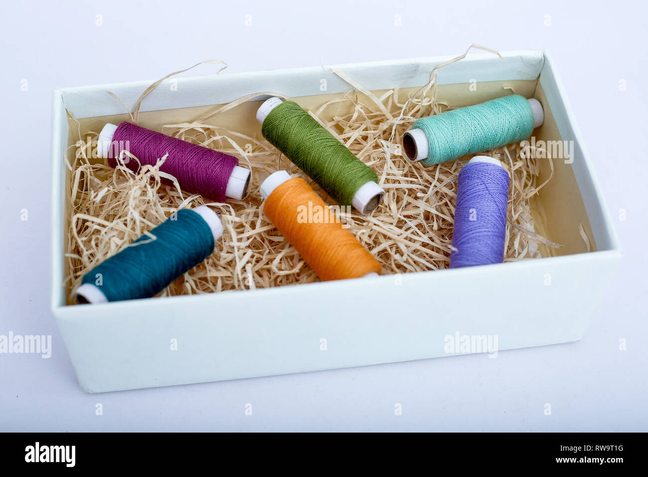 Picture of thread in the box. Isolated on the white background Stock ...