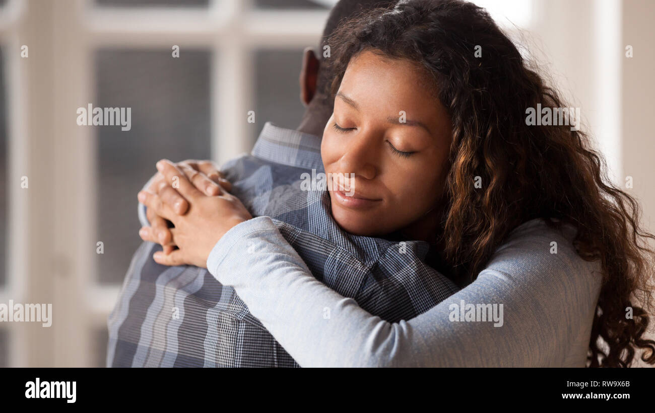 Loving girlfriend hug boyfriend happy to reconcile after fight Stock ...