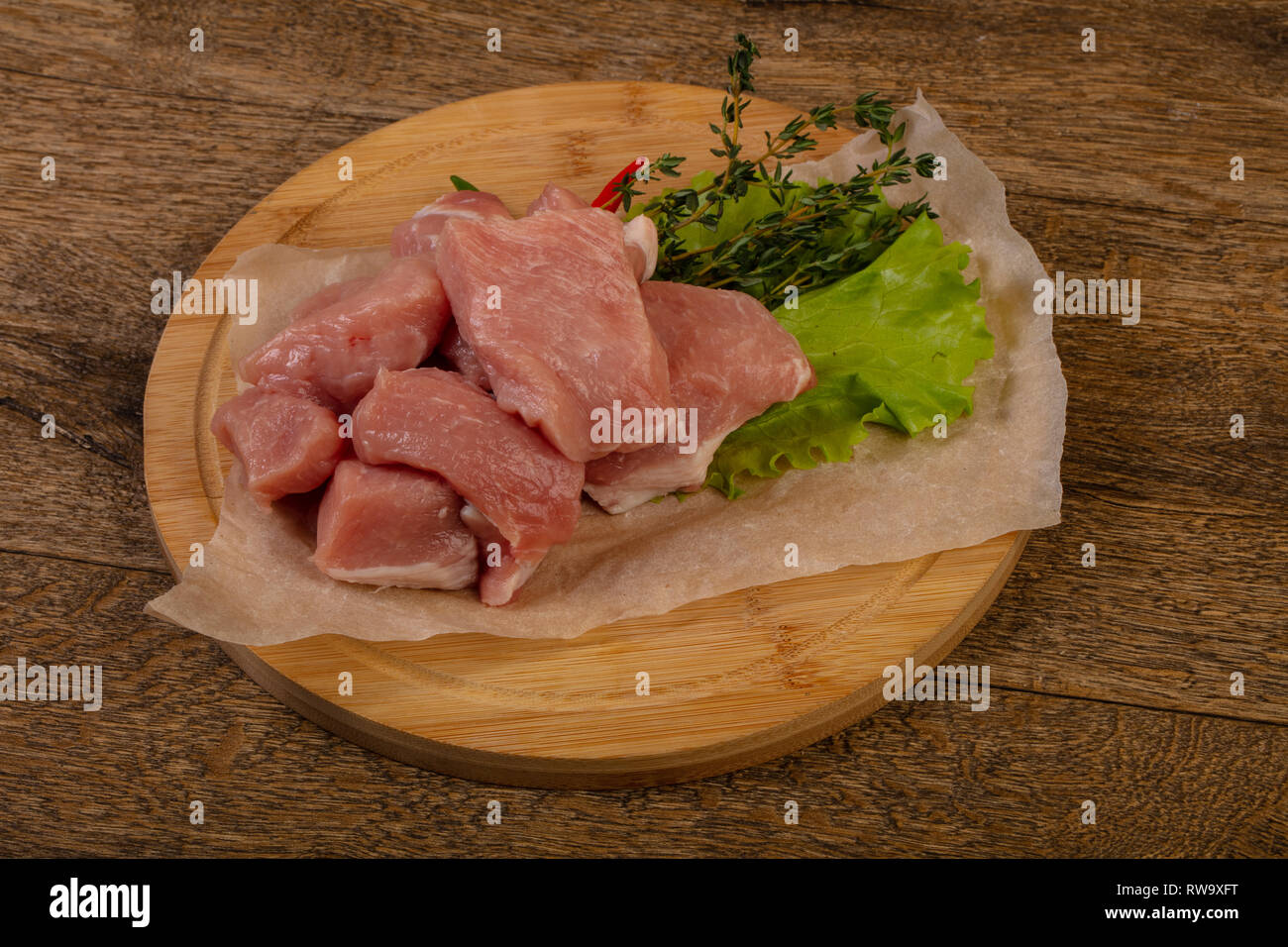 Raw pork meat heap for roast Stock Photo - Alamy