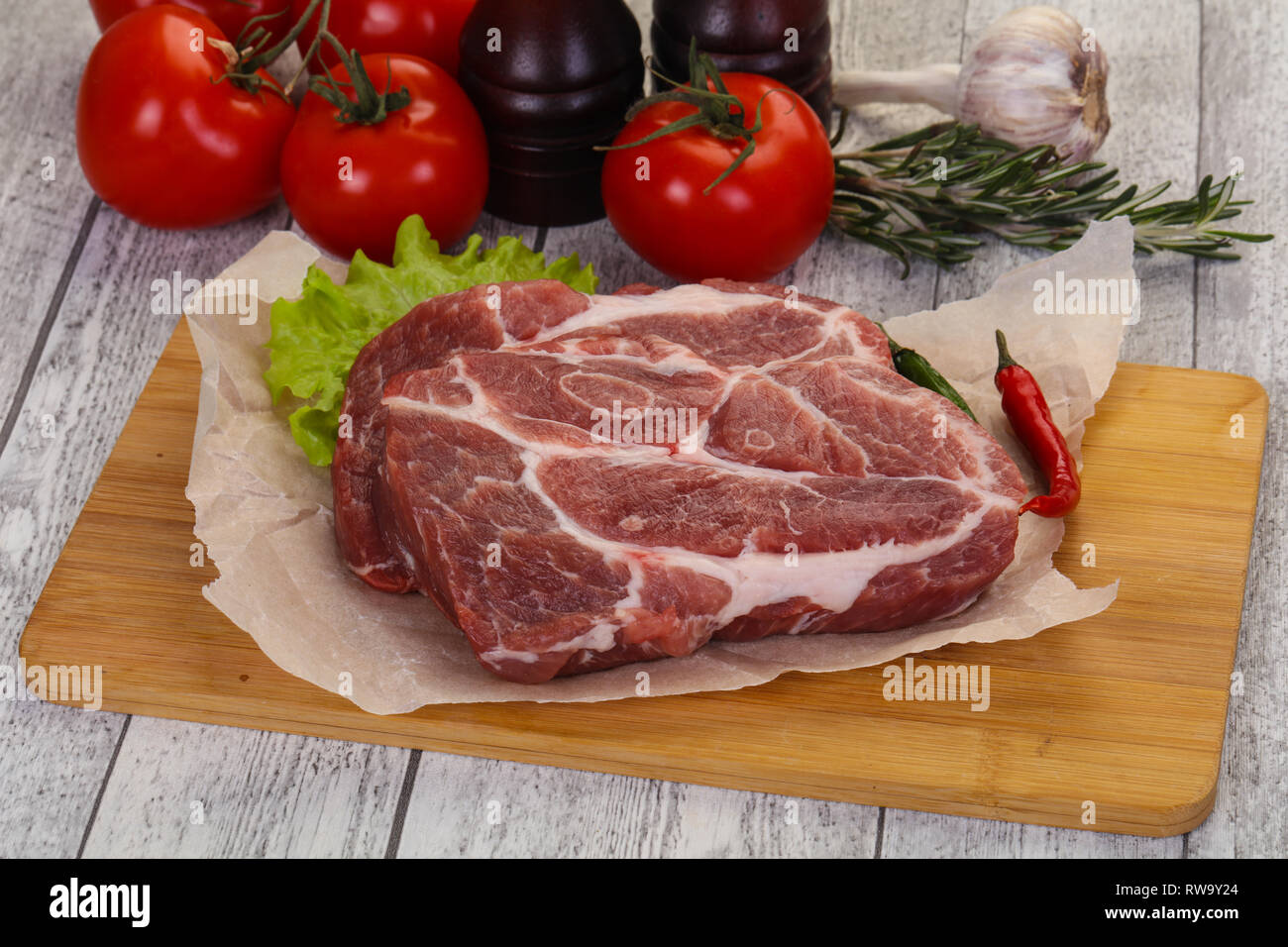 Raw pork neck steak ready for cooking Stock Photo - Alamy