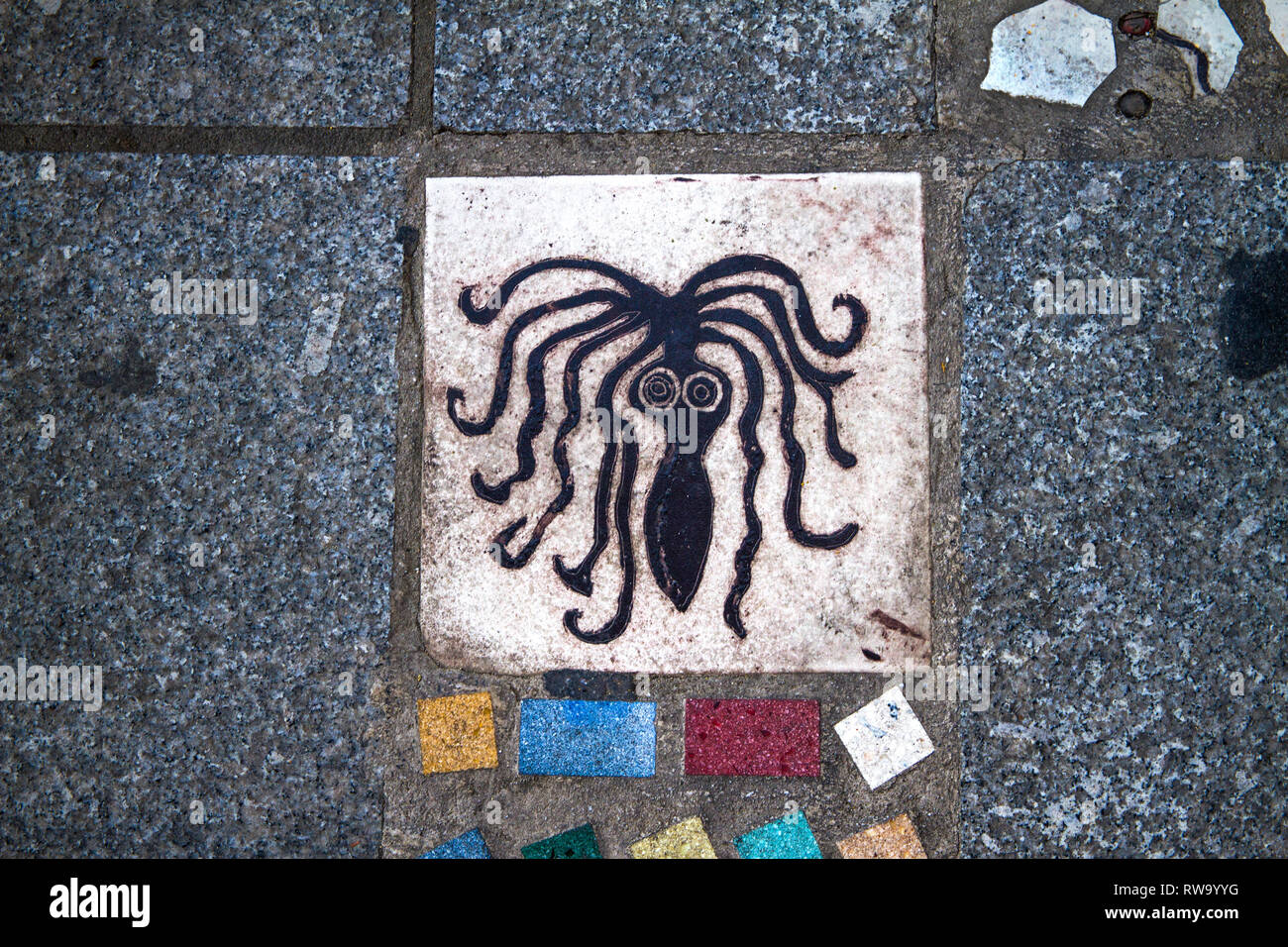 Interesting ceramic decorative tile. Funny tile with octopus motif in a ...