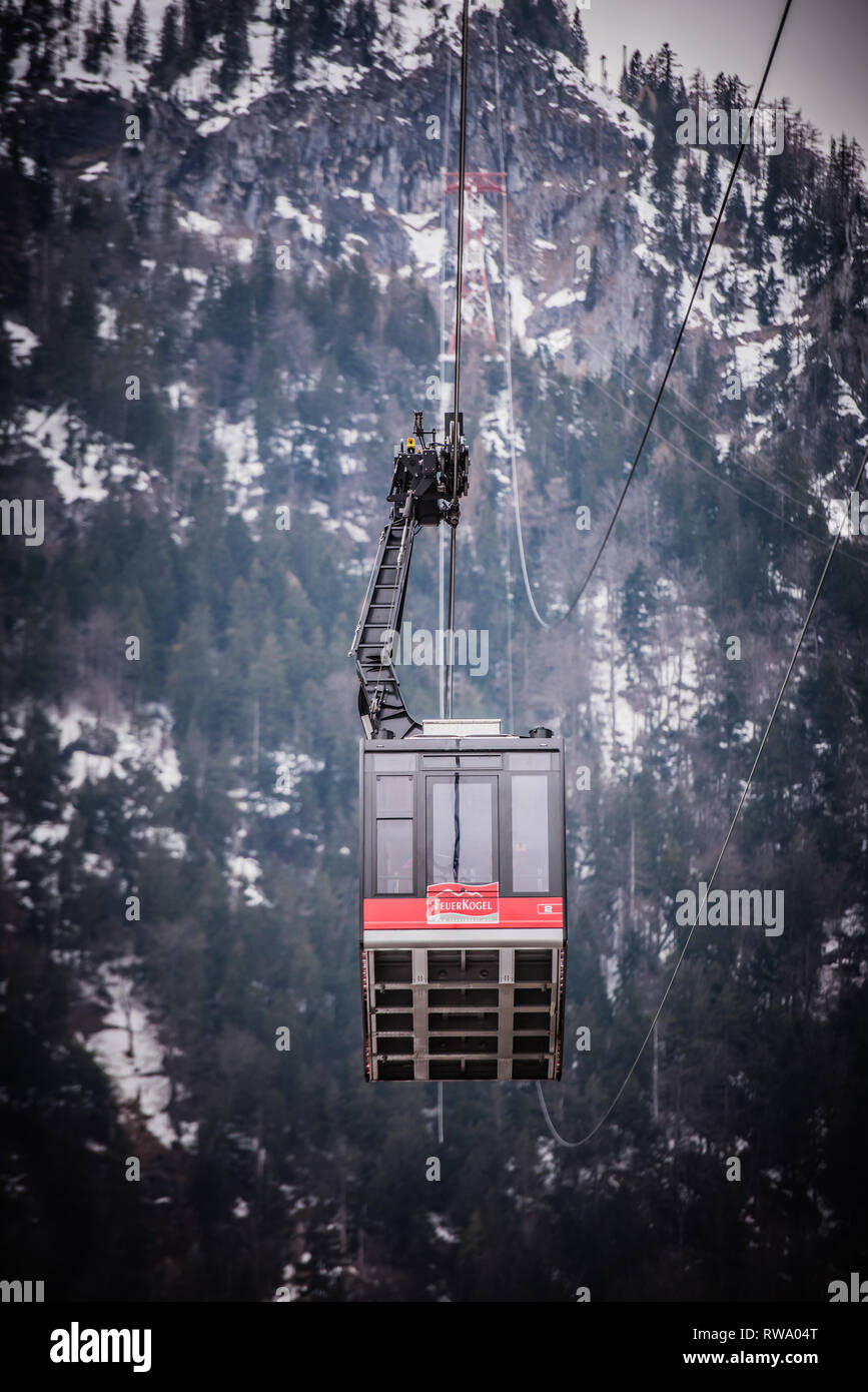 The cable car travels down the mountain to the station at Feuerkogel ...