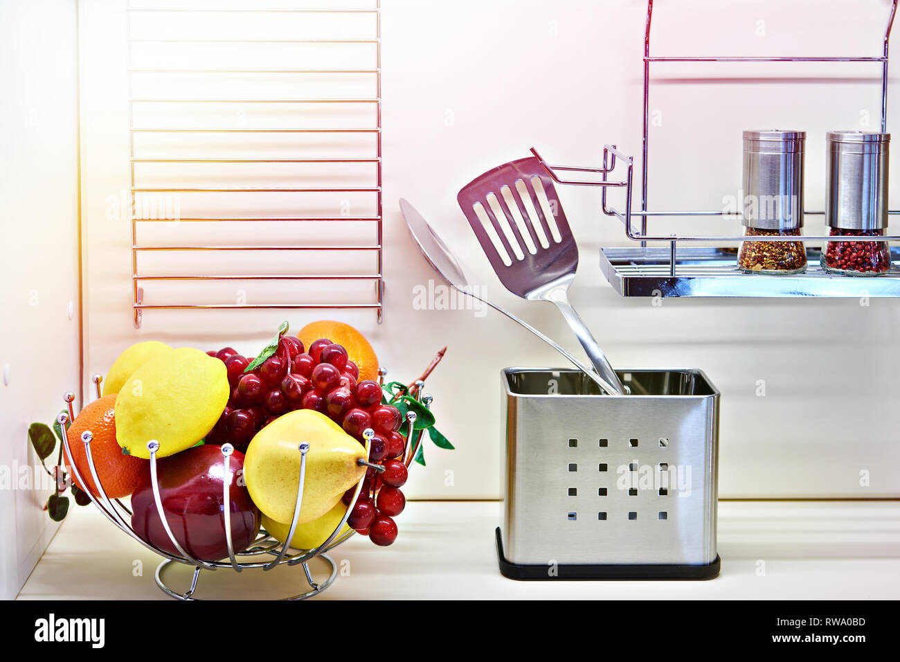 Fruit basket, spices and cooking utensils Stock Photo - Alamy