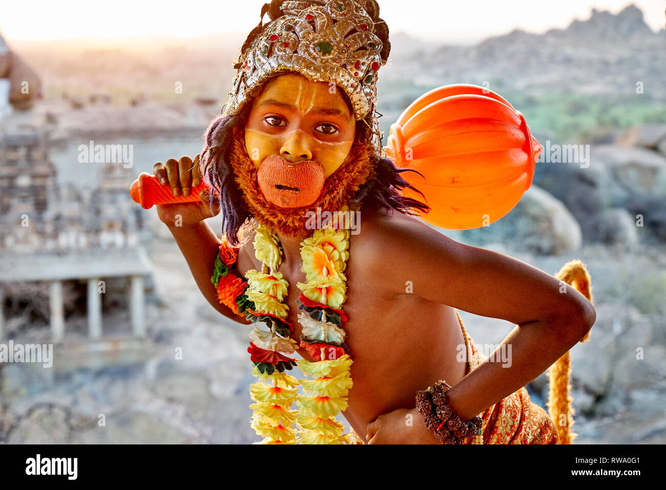 young boy dressed like Hanuman the monkey king, Hampi, UNESCO world ...