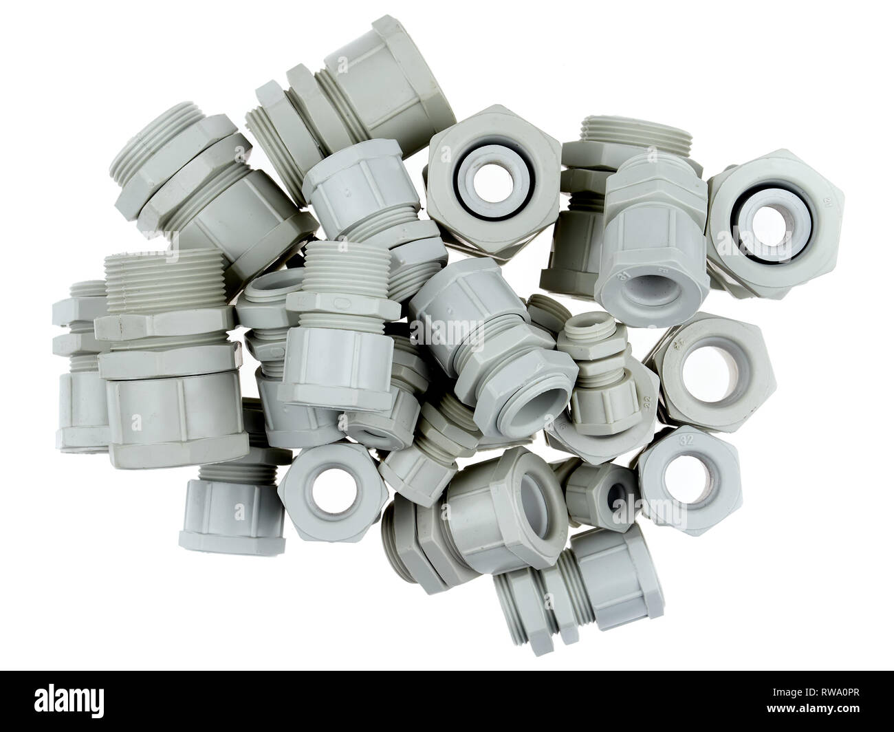 A group of plastic cable glands isolated on white background Stock ...
