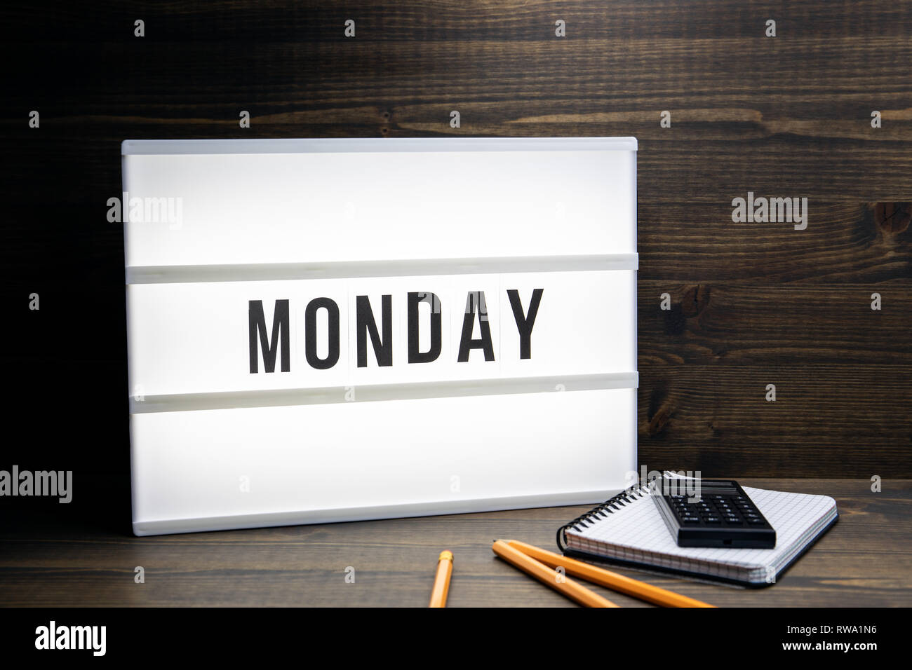 Monday concept. Text in lightbox Stock Photo - Alamy