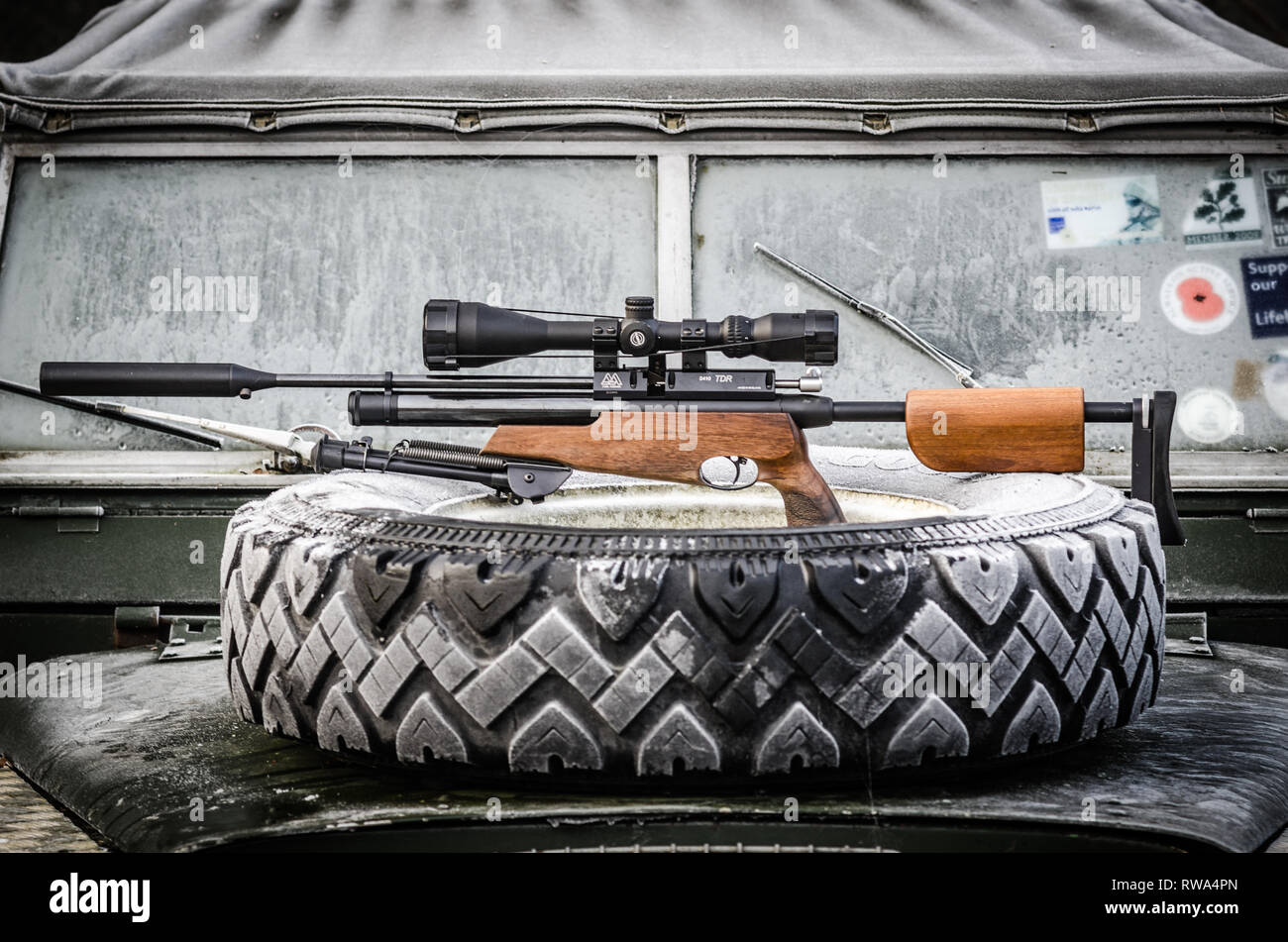 detail of Land Rover and rifle Stock Photo - Alamy