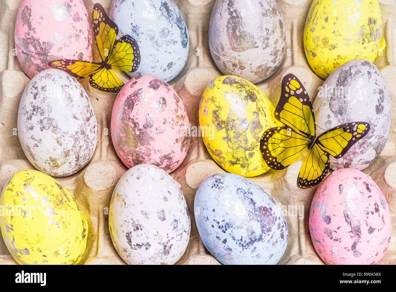 Happy Easter. Multi-colored Easter eggs in the egg cells. Easter card ...