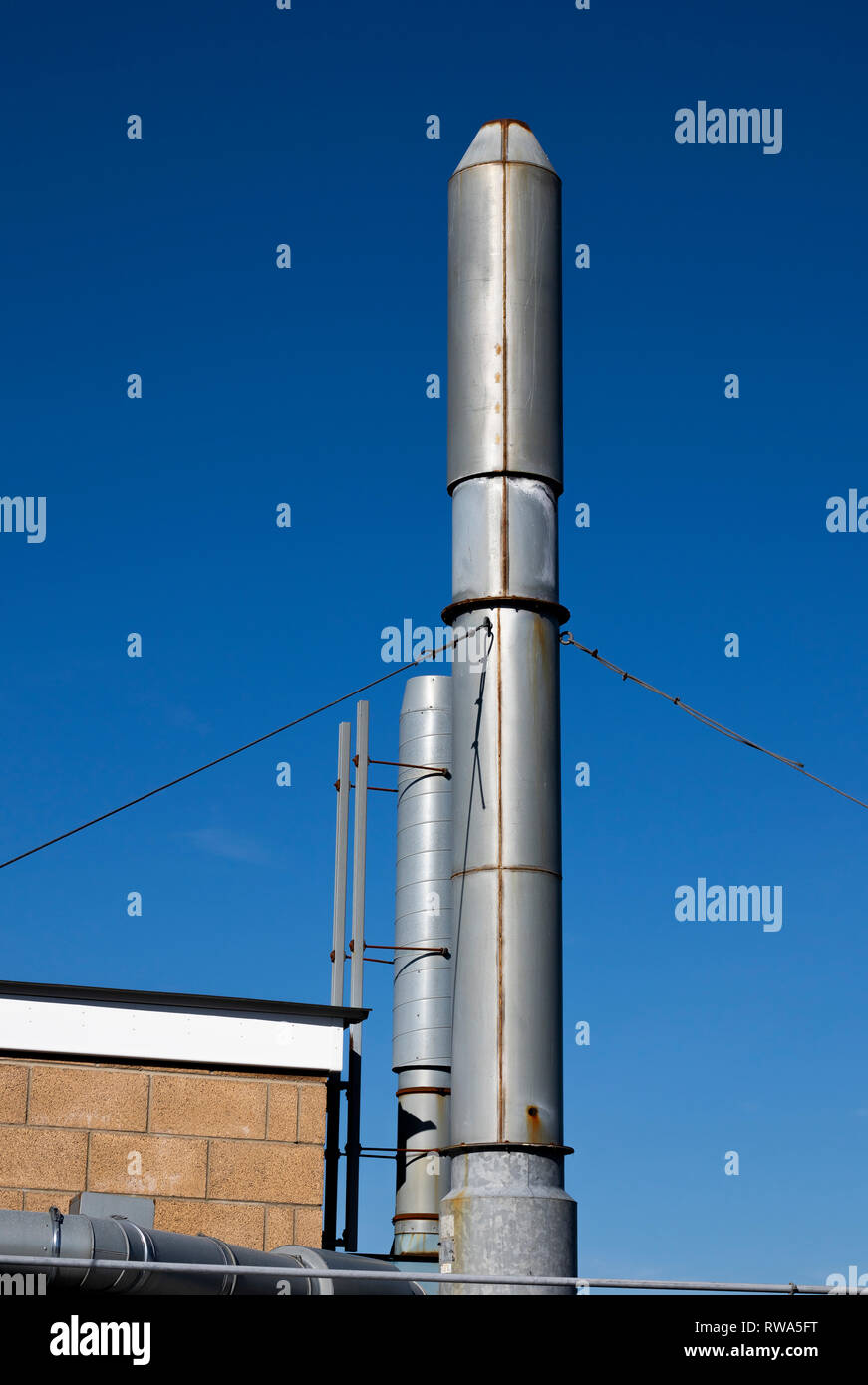 extract ventilation chimneys to manufacturing facility Stock Photo - Alamy