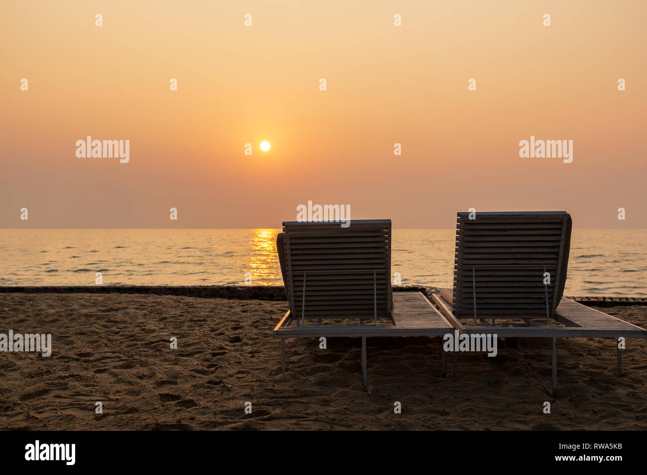 Empty sunbeds on the beach hi-res stock photography and images - Alamy