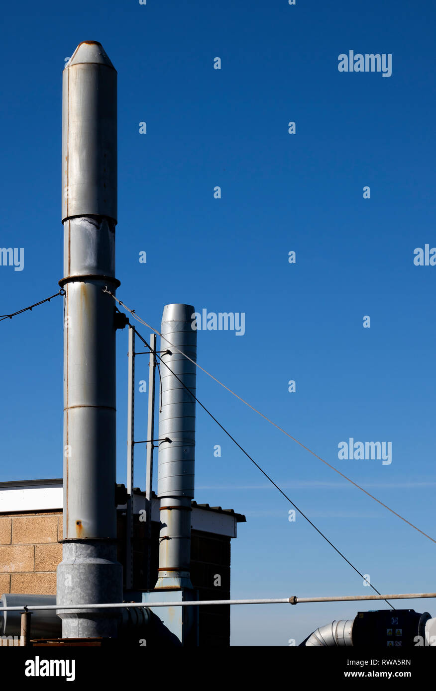 extract ventilation chimneys to manufacturing facility Stock Photo - Alamy