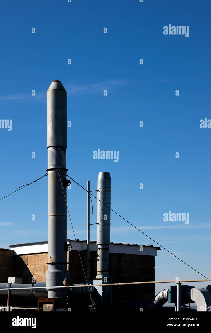 extract ventilation chimneys to manufacturing facility Stock Photo - Alamy