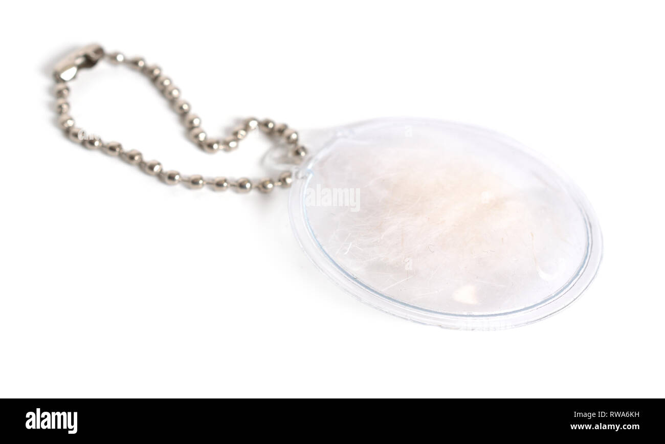 Transparent Silicone tag with feather and down filling sample. Isolated ...