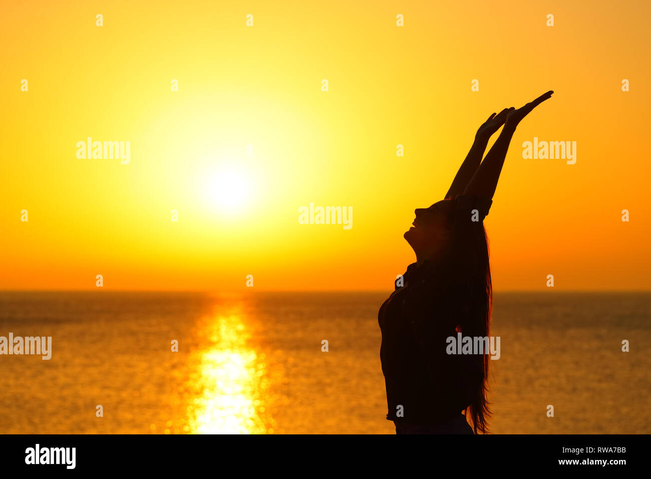 Sun arms raising beach hi-res stock photography and images - Alamy
