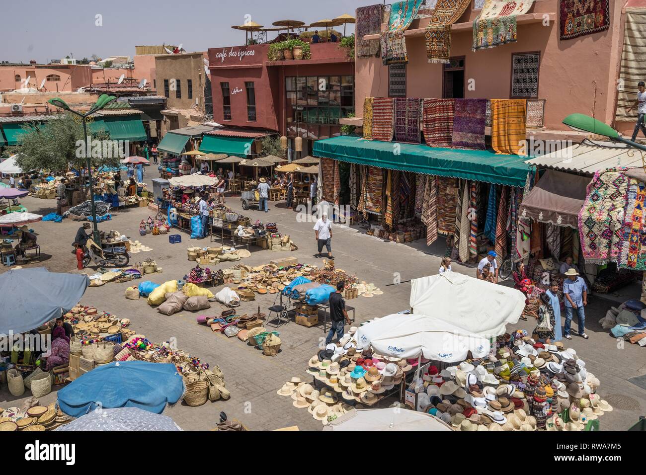 Carpets and wickerwork at the bazaar, Marrakech, Morocco Stock Photo ...