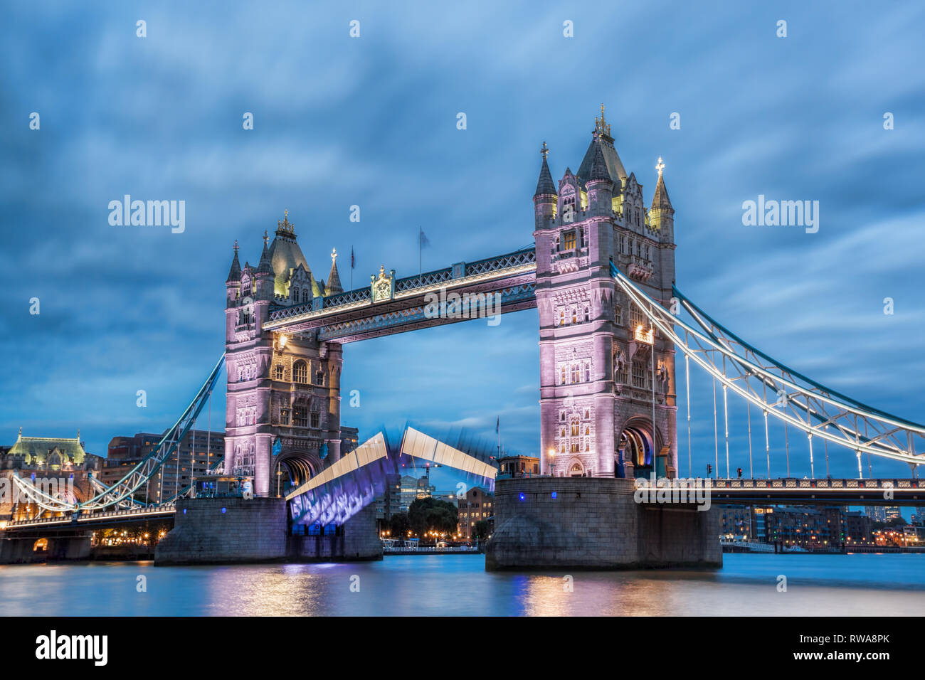 Famous Tower Bridge with open gate in the evening, London, England, UK ...