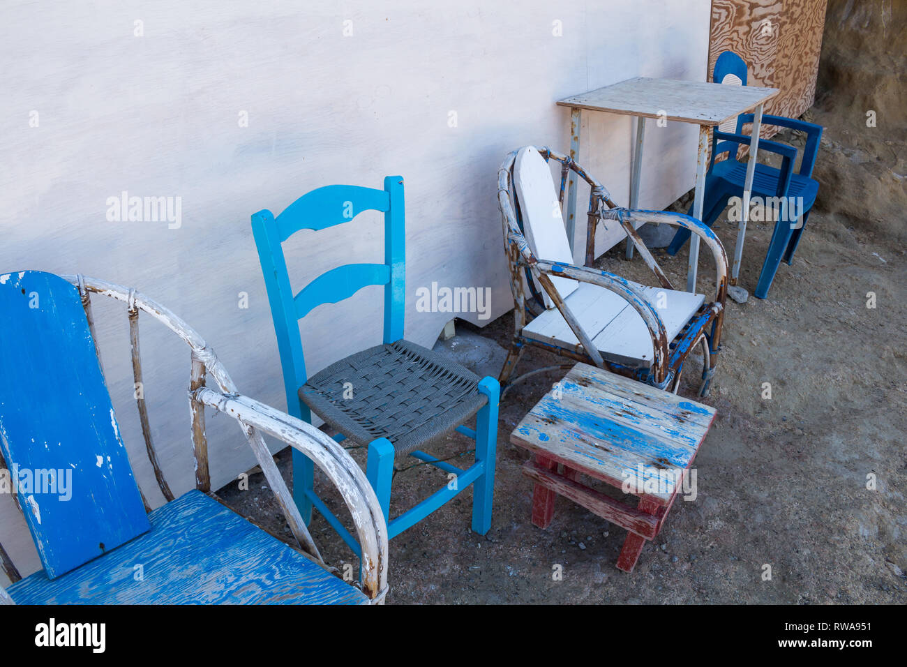 Group of various old chairs, all in blue and white combination, the ...