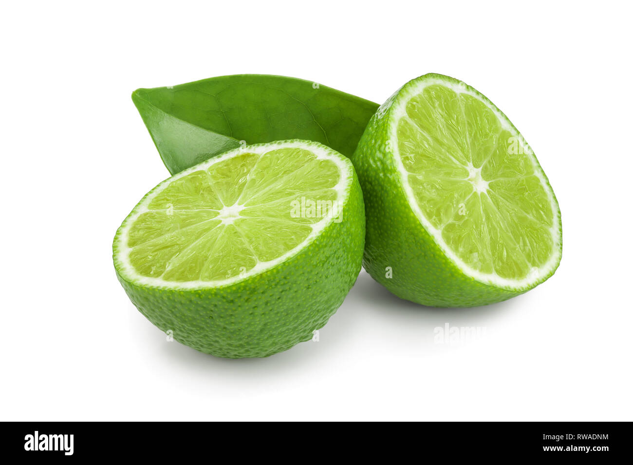 half lime with leaves isolated on white background Stock Photo - Alamy