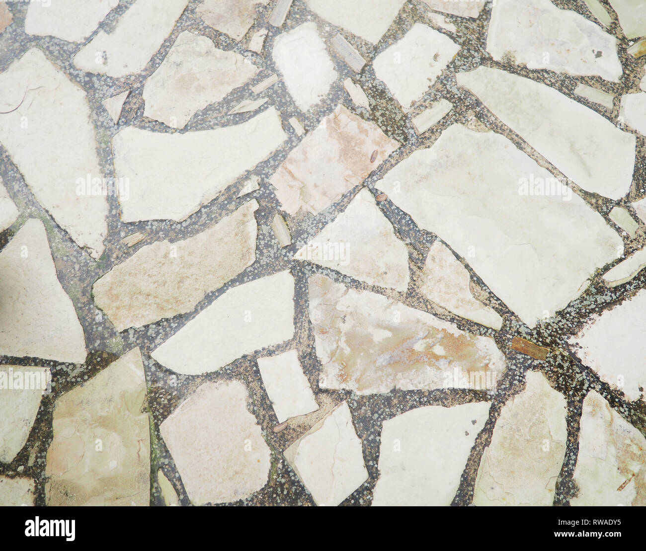 Fragment of a wall from a chipped stone Stock Photo - Alamy